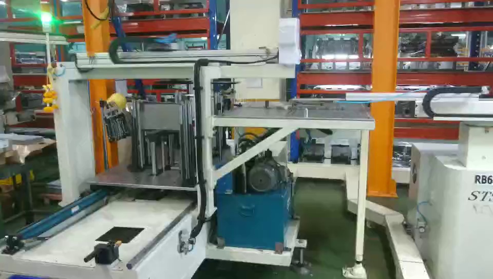 Swing arm stamping robot at Canon site in Thailand--